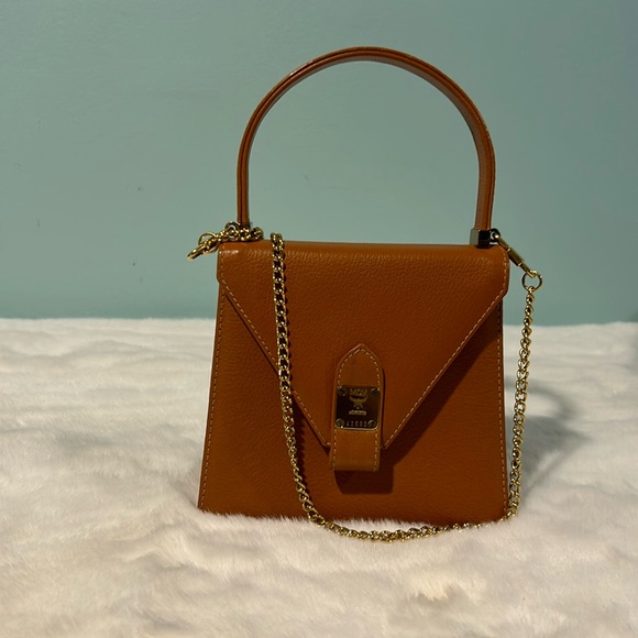 MCM | Bags | Mcm Micromini Bag Great Condition Detachable Gold Chain ...